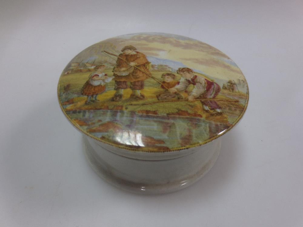 Lot 10 - A Prattware paste pot and lid