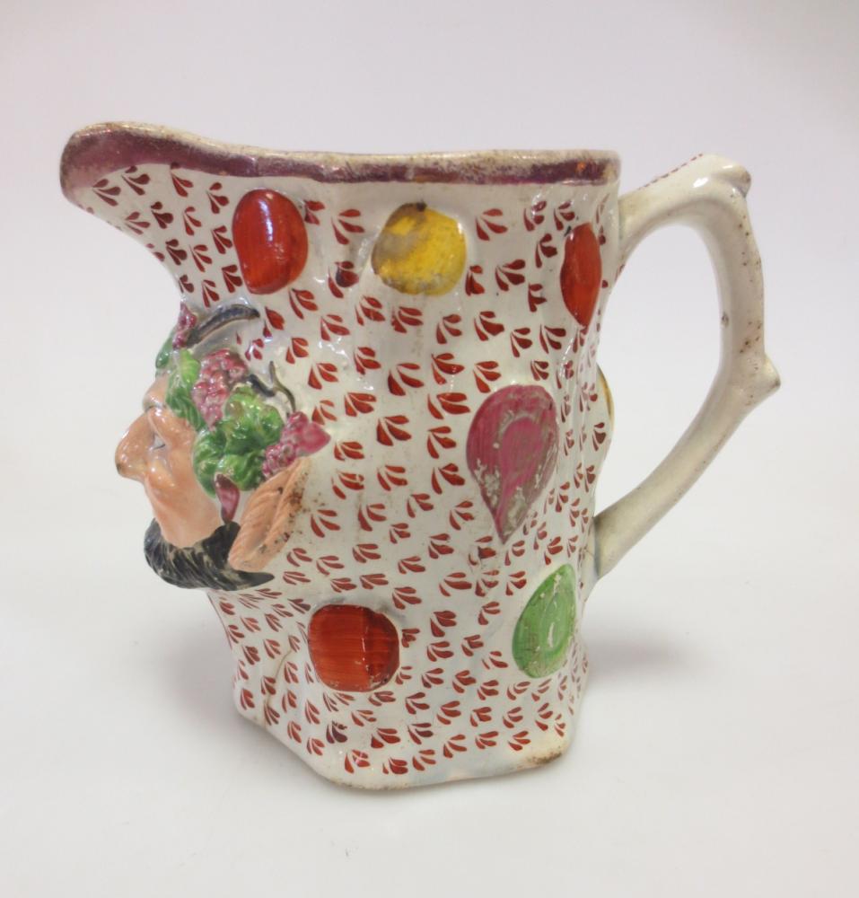 Lot 20 - An early 19th century satyr's mask jug