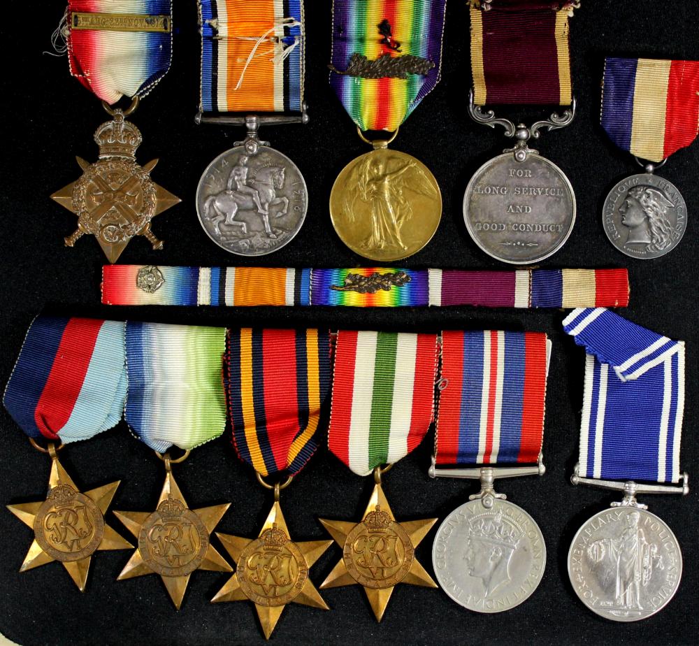 Lot 256 - Two medal groups: