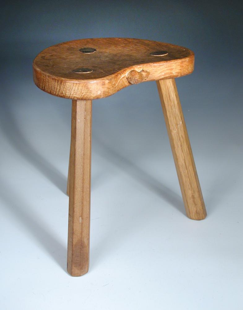 Lot 960 - A Robert 'Mouseman' Thompson oak stool,