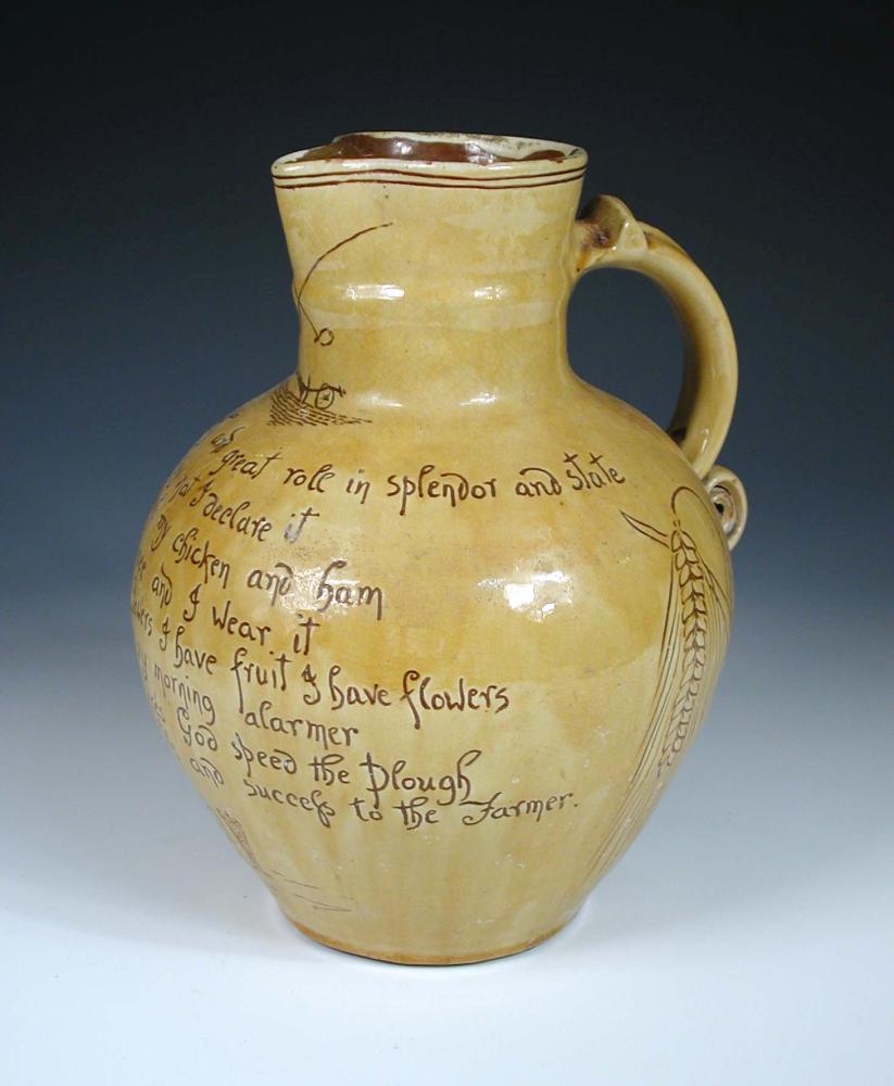 Lot 14 - An Edwin Beer Fishley, Fremington jug,