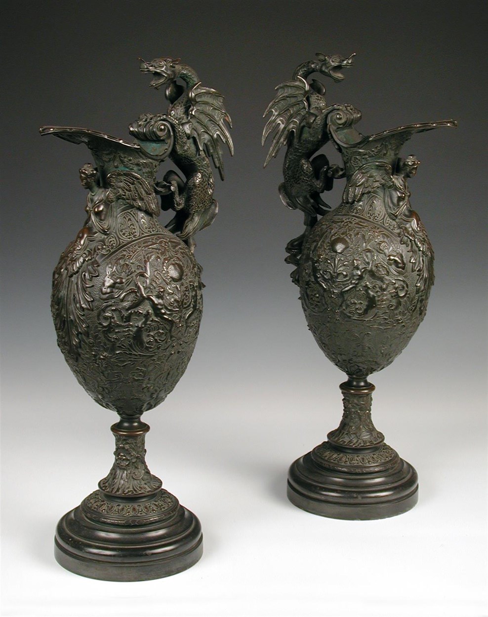 Lot 900 - A pair of 19th century bronze ewers,