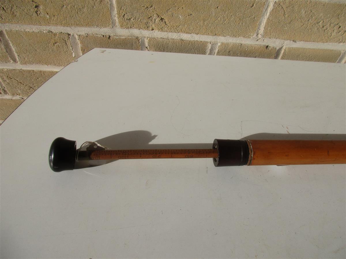 Lot 600 - A walking cane measuring stick with horn