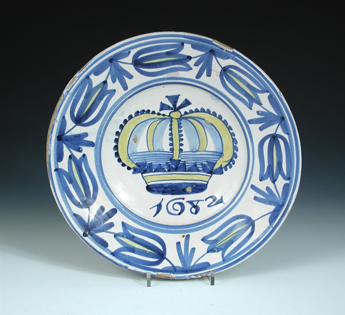 Lot 1 - A rare Delft dated dish, probably London