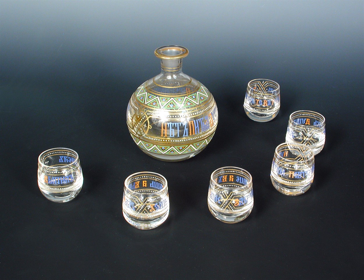 Lot 1 - A late 19th century Russian glass vodka set,