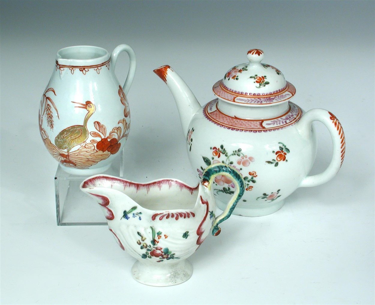 Lot 15 - A Lowestoft polychrome teapot and cover,