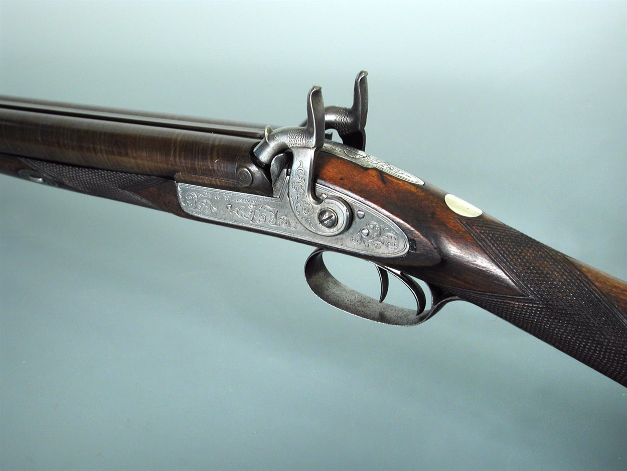 Lot 700 - A percussion shotgun, the sidelock engraved