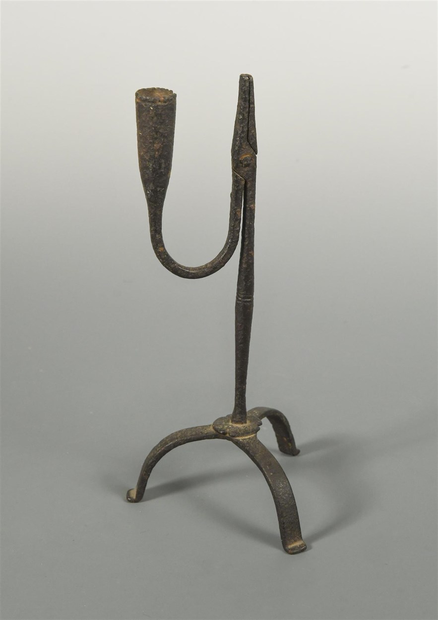 Lot 276 - An 18th century rush light holder,