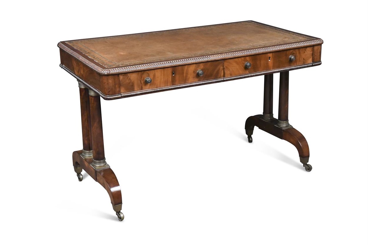 Lot 383 - A late Regency mahogany library table,