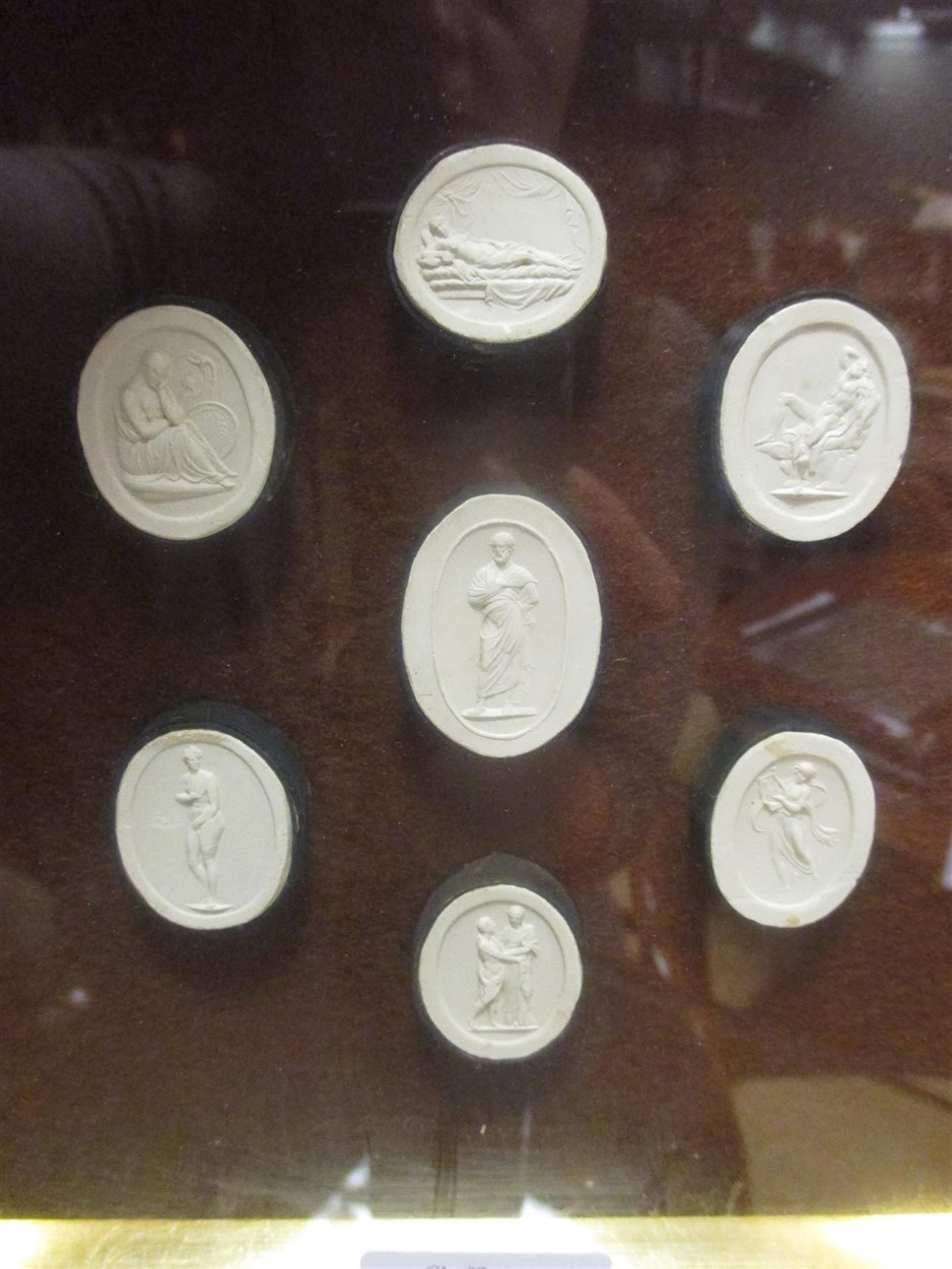 Lot 36 - A cased set of seven intaglios, depicting