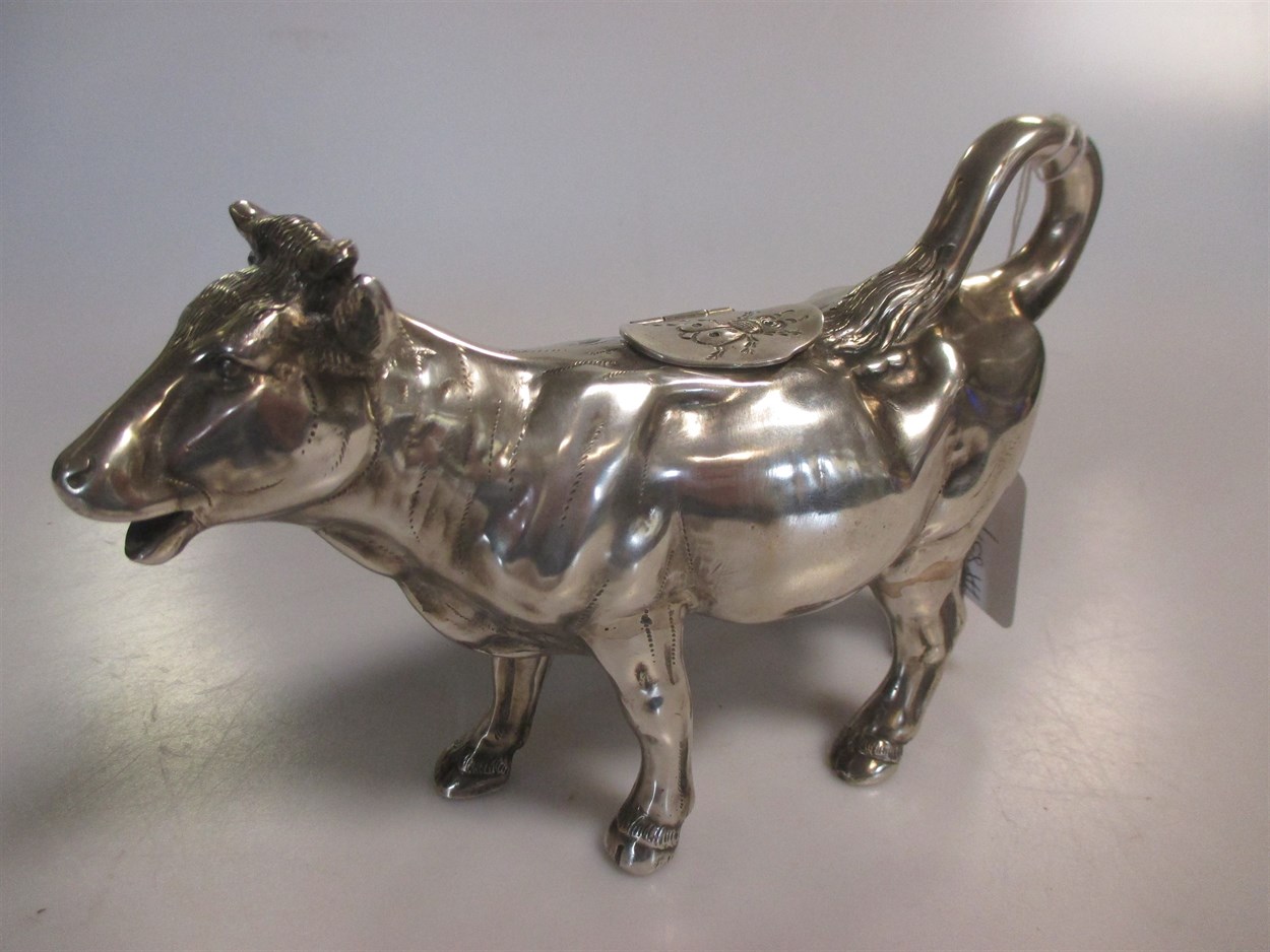 Lot 226 - A German metalwares silver naturalistic cow