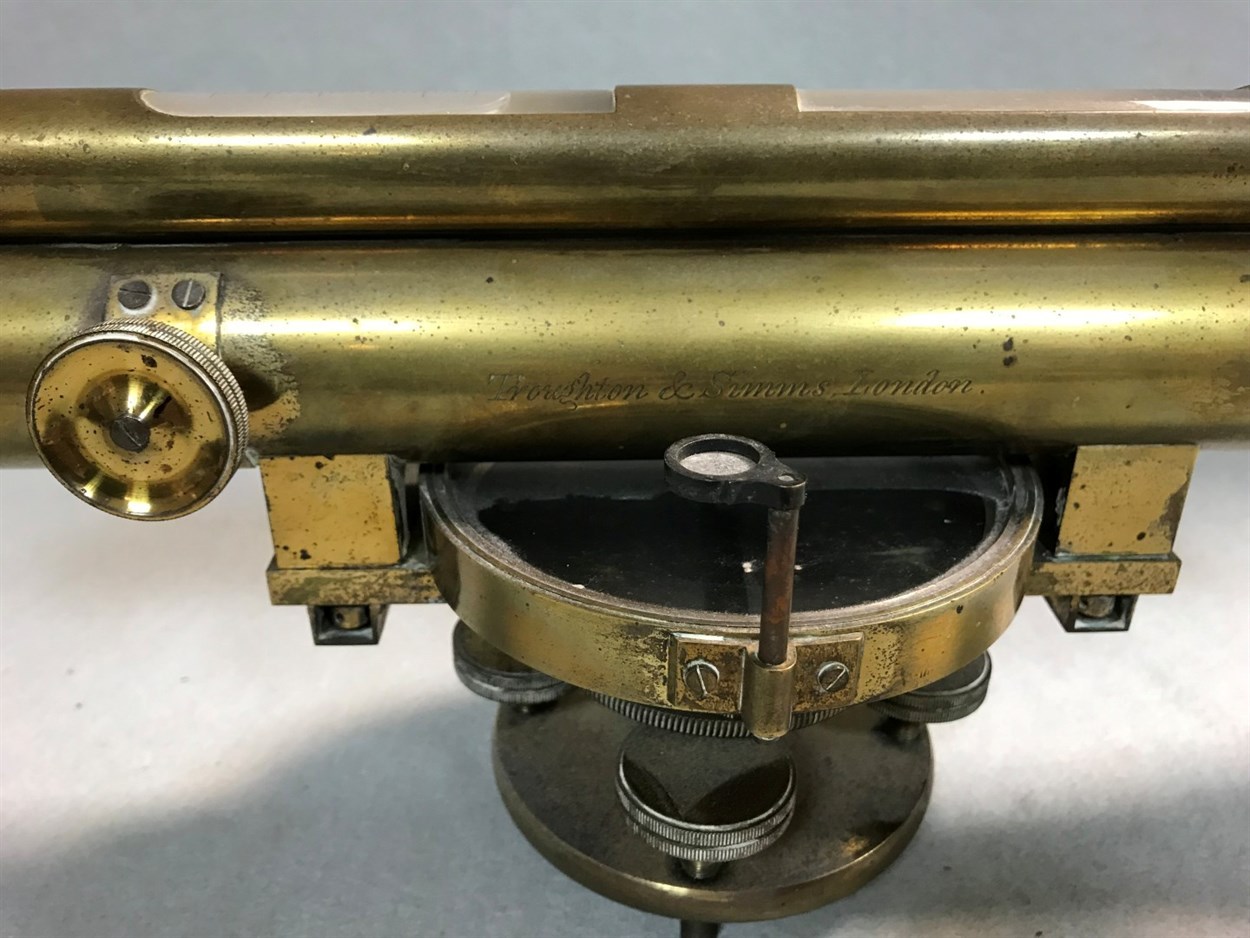 Lot 110 - A lacquered brass surveying level by