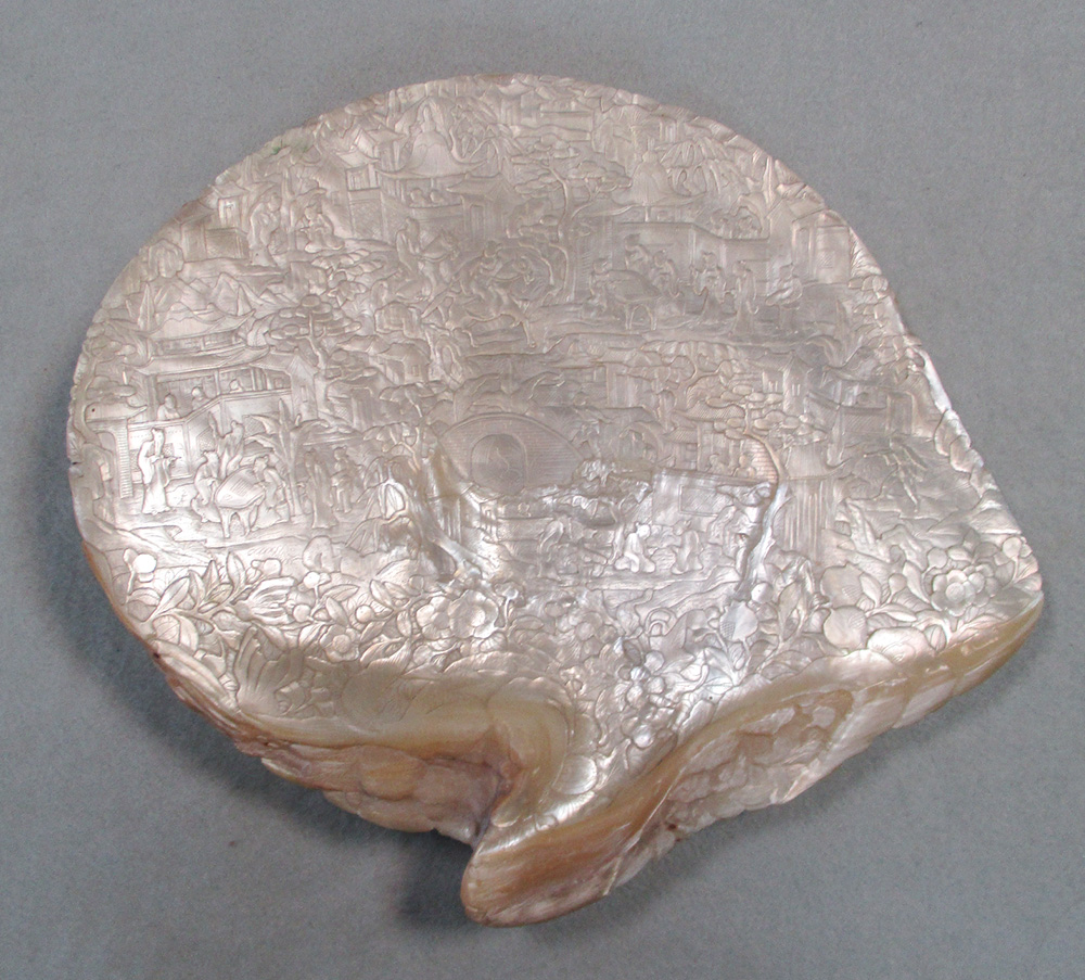Lot 100 - A Chinese export carved oyster shell, Canton,