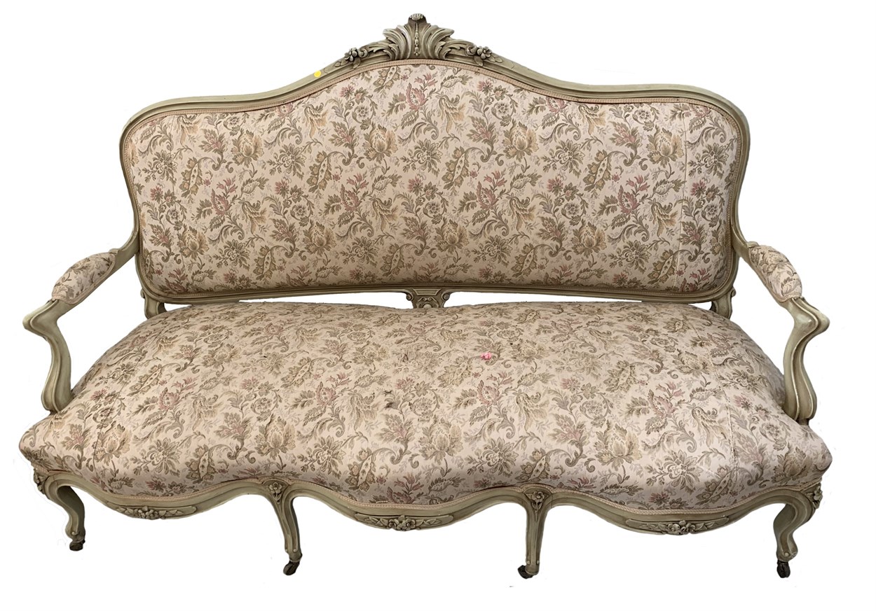 Lot 58 - A French painted salon suite carved with