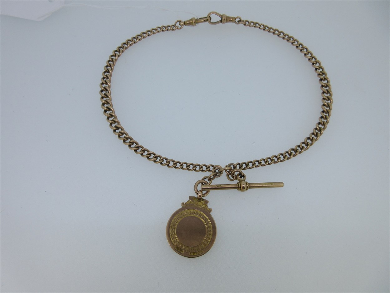 Lot 4 - A 9ct gold double albert watch chain and