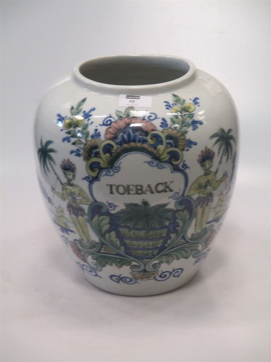 Lot 88 - A pair of modern dutch porcelain tobacco jars,