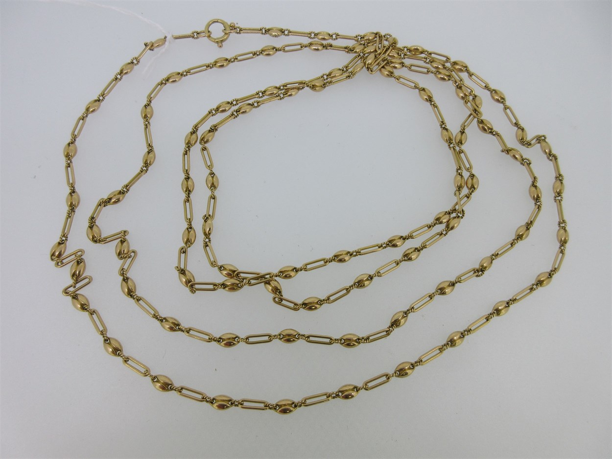 Lot 114 - A fancy link long chain stamped '15c',