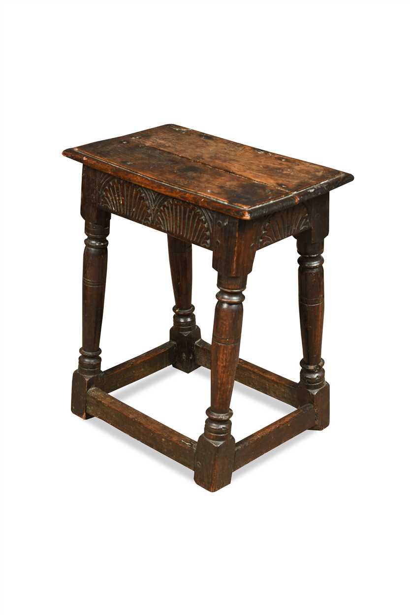 Lot 433 - A 17th Century oak coffin stool,