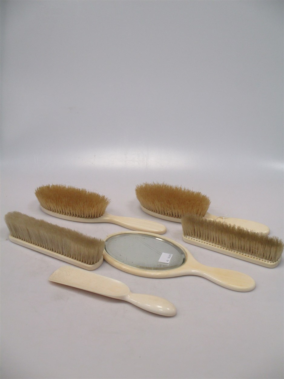 Lot 105 - An ivory dressing table set circa 1940,