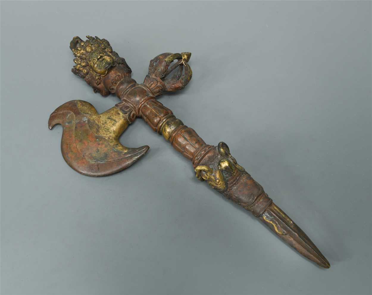 Lot 41 - Tibetan Khatvanga bronze ritual axe,