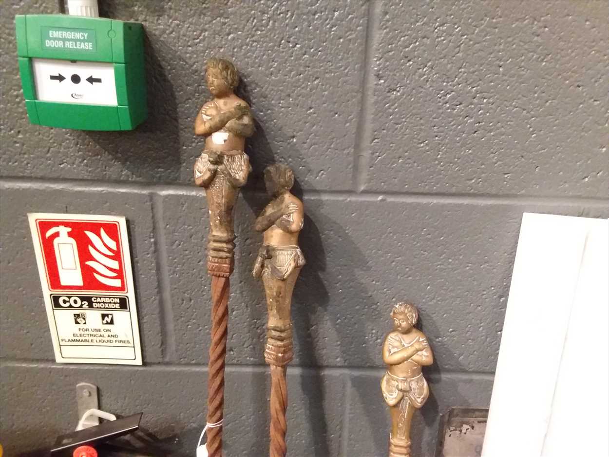 Lot 368 - Three long-handled steel fire irons with