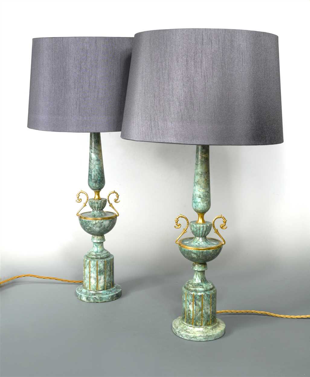 Lot 317 - A pair of neoclassical green alabaster table