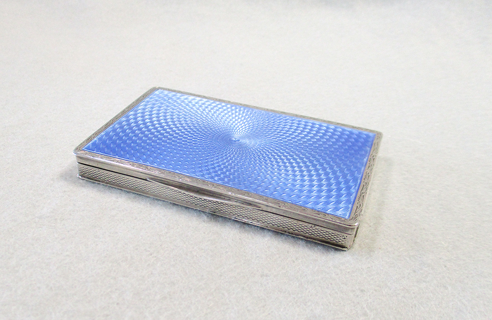 Lot 326 - A George V silver and enamel card case,