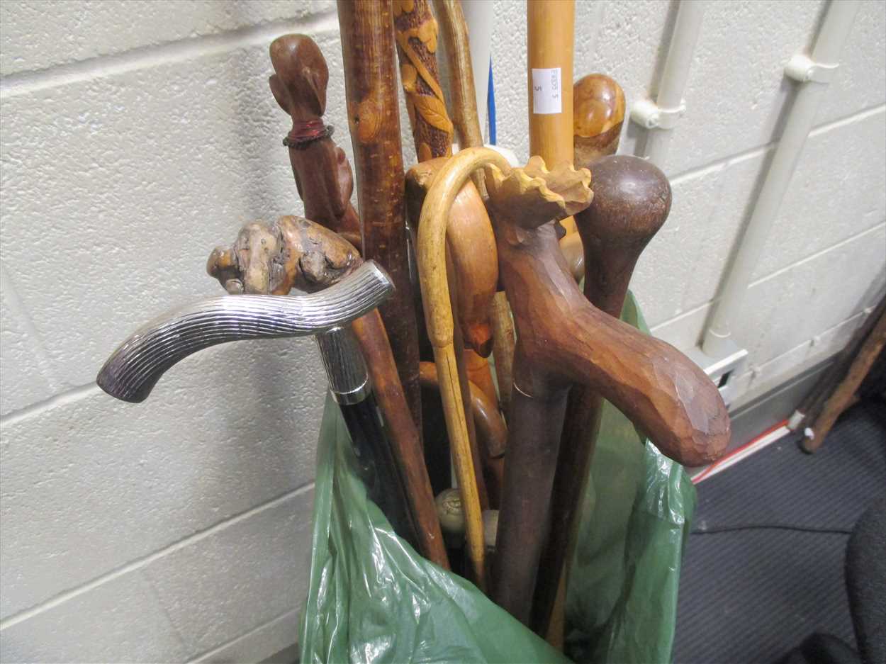 Lot 154 - A collection of walking sticks
