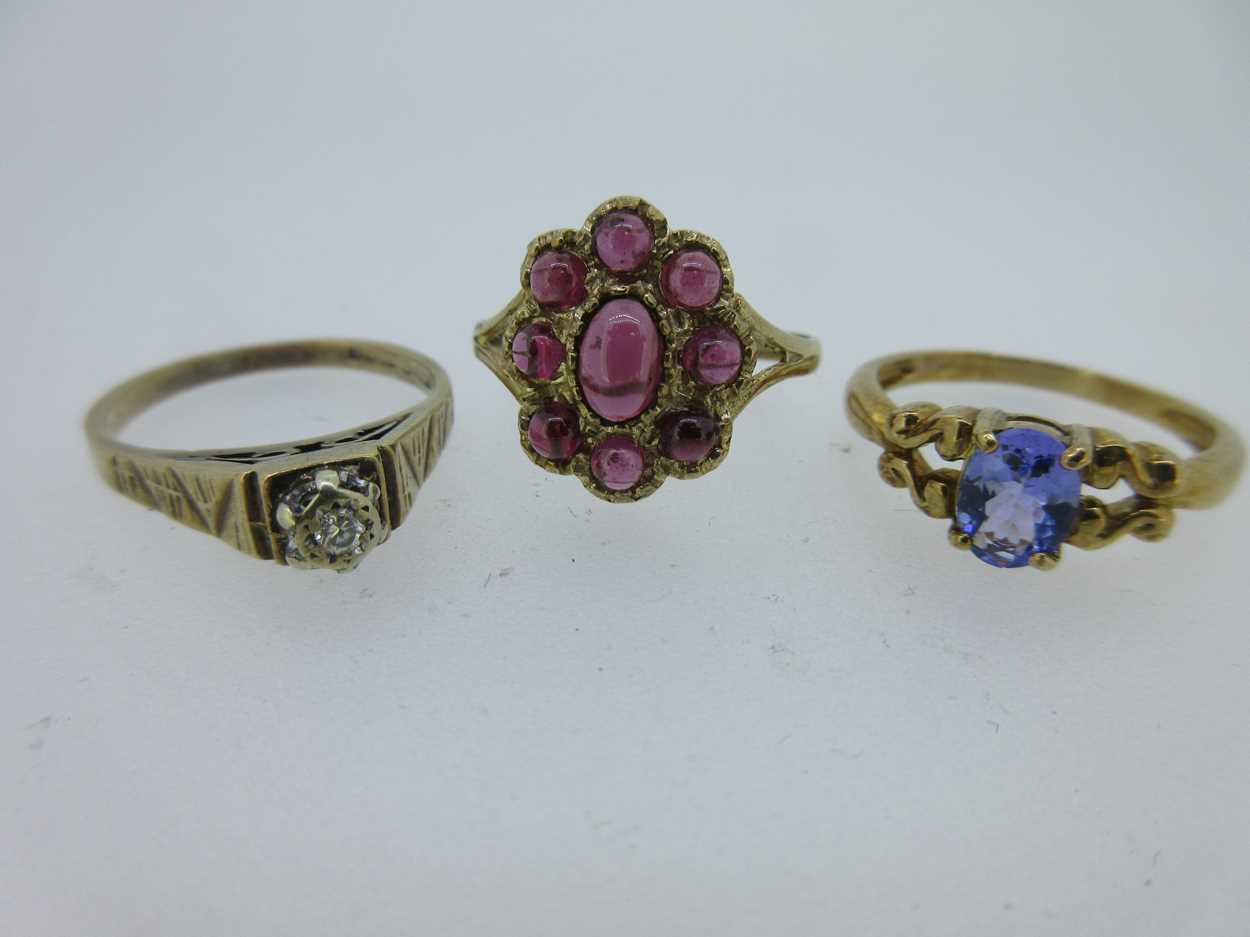 Lot 182 - Three hallmarked gold and gemset rings,