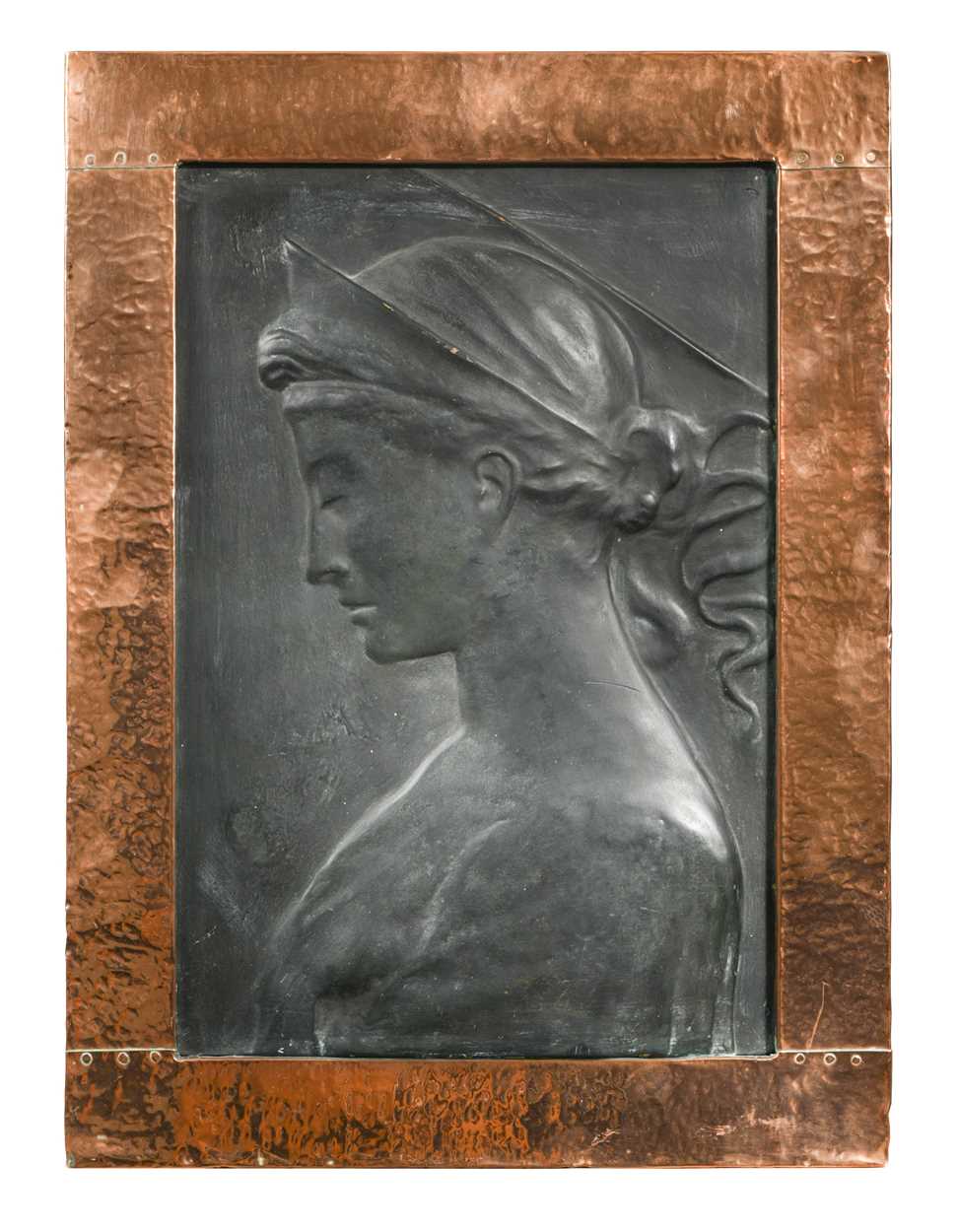 Lot 50 - A black painted plaster relief panel