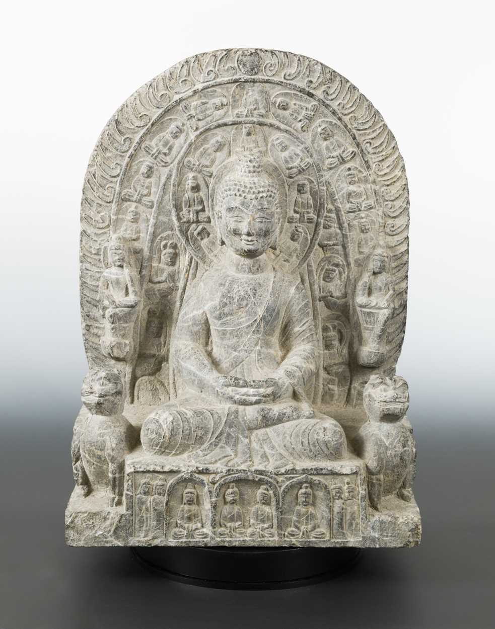Lot 152 - A Chinese grey veined stone Buddhist triad