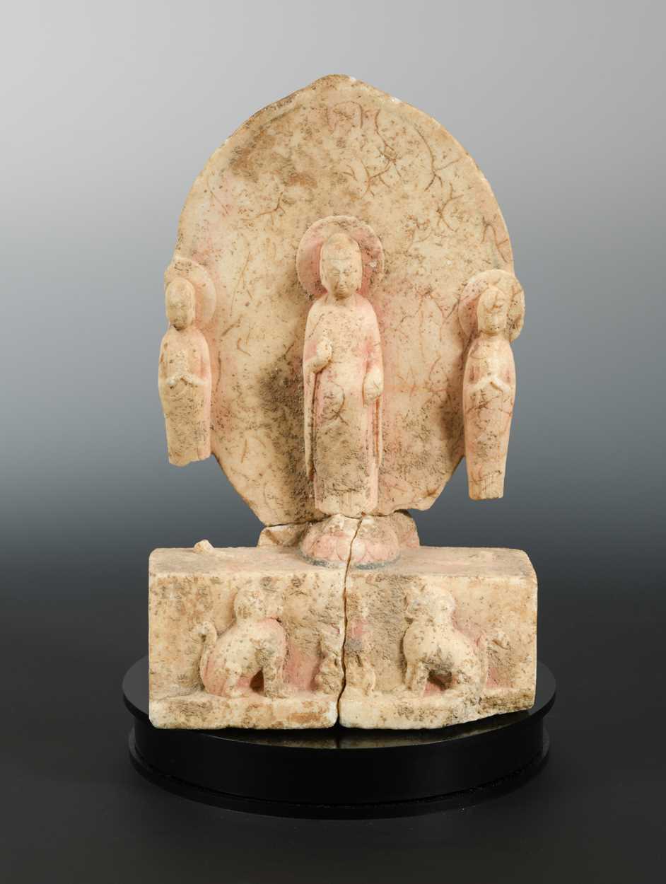 Lot 177 - A Chinese white marble Buddhist triad group,