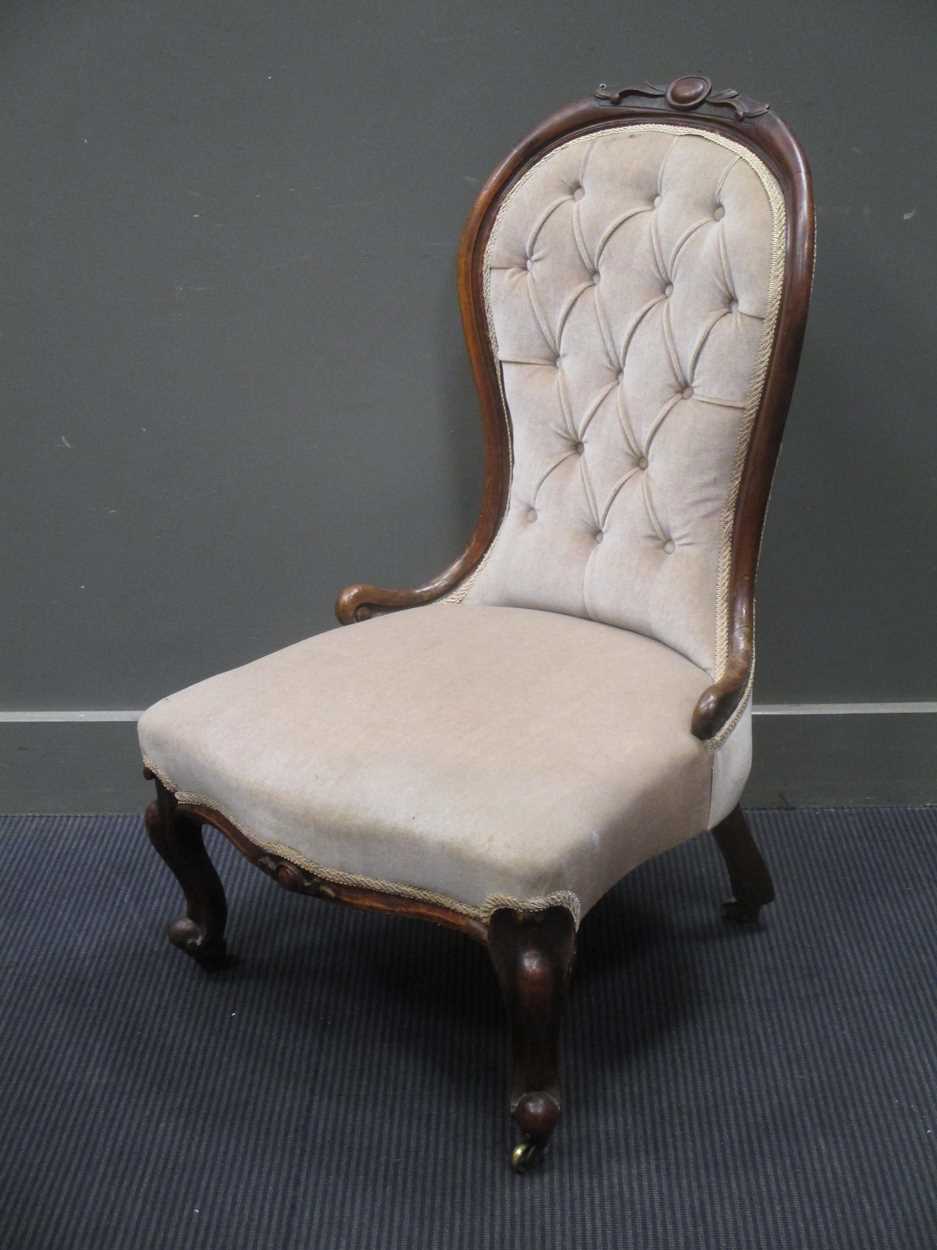 Lot 320 - A Victorian mahogany frame button back chair