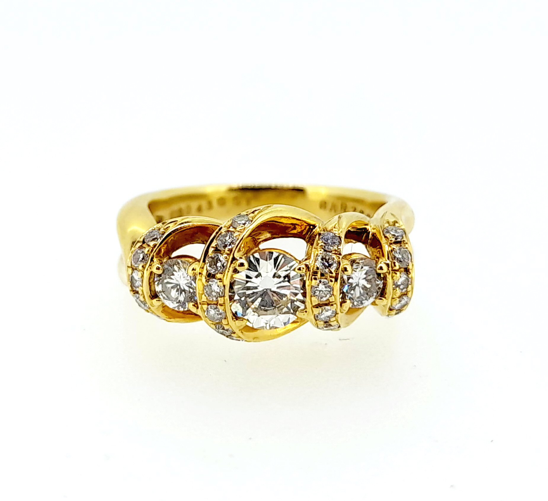 Lot 120 - A modern fancy twist diamond set ring,