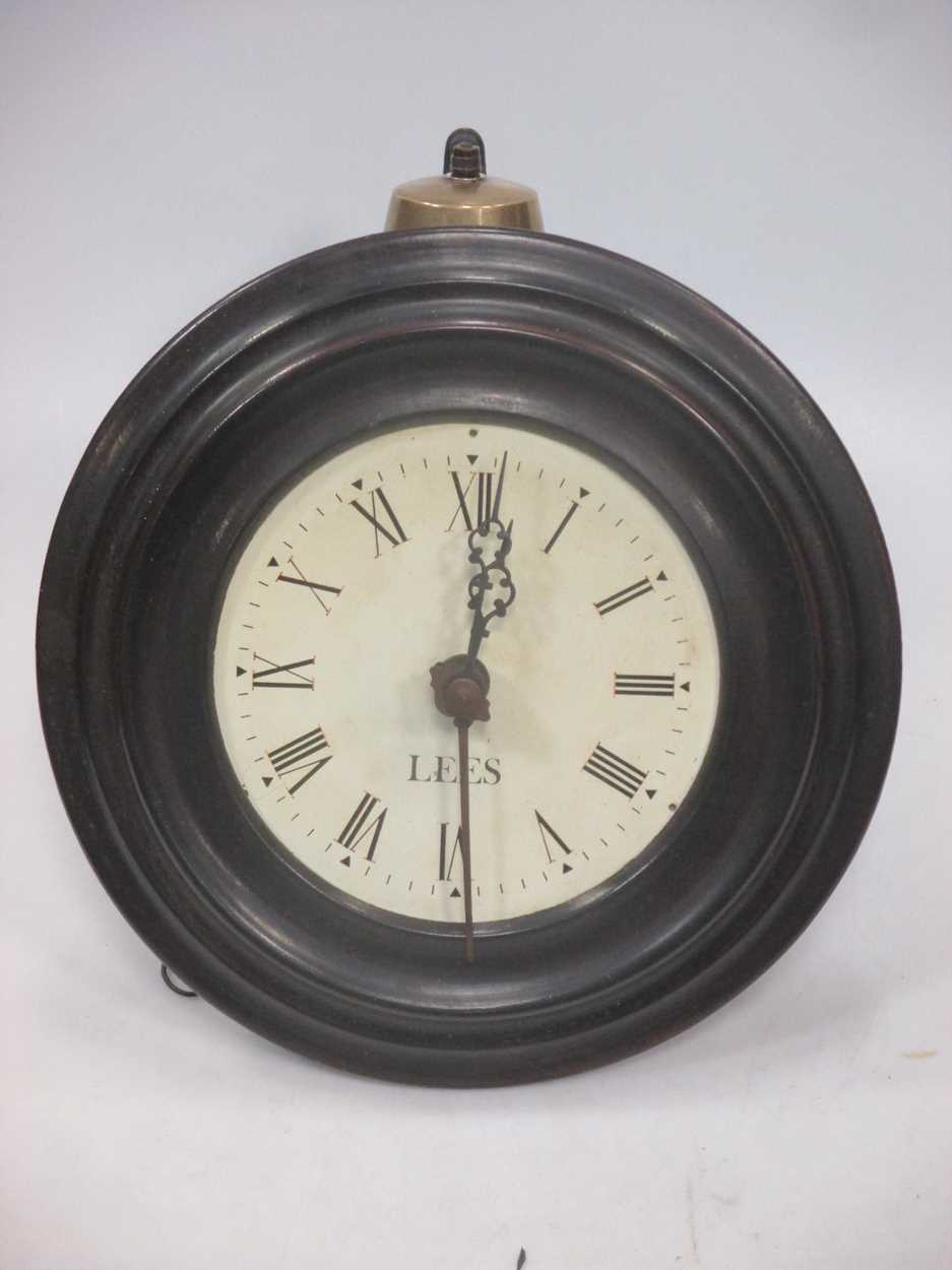 Lot 142 - A Lees Postman's alarm clock, early 20th