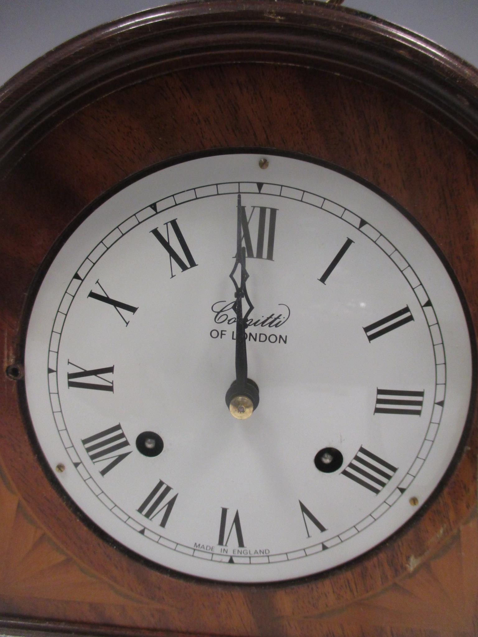 Lot 17 - A modern mantle clock by Comitti in mahogany