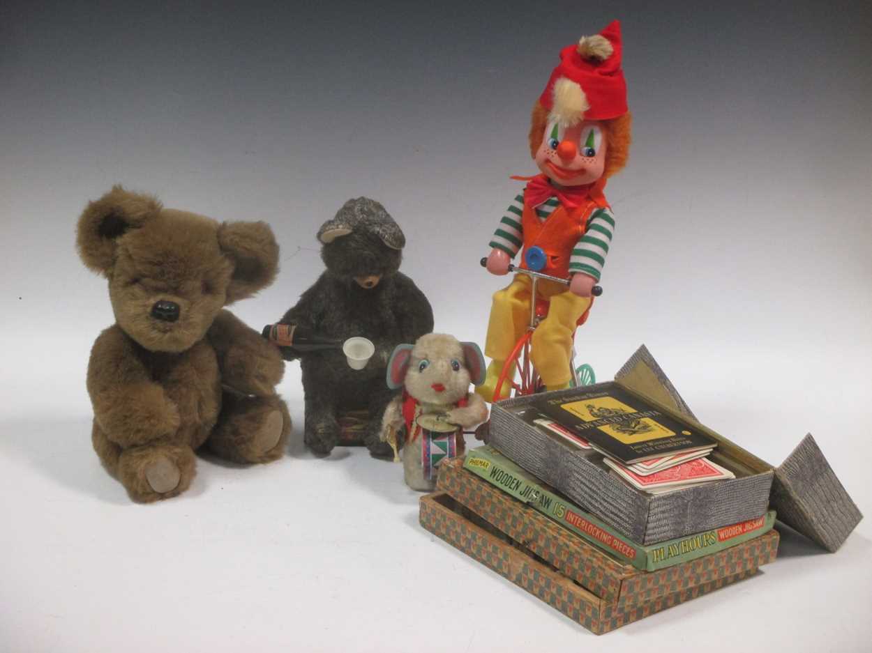 Lot 80 - A tinplate-base clockwork bear drinking Pepsi,