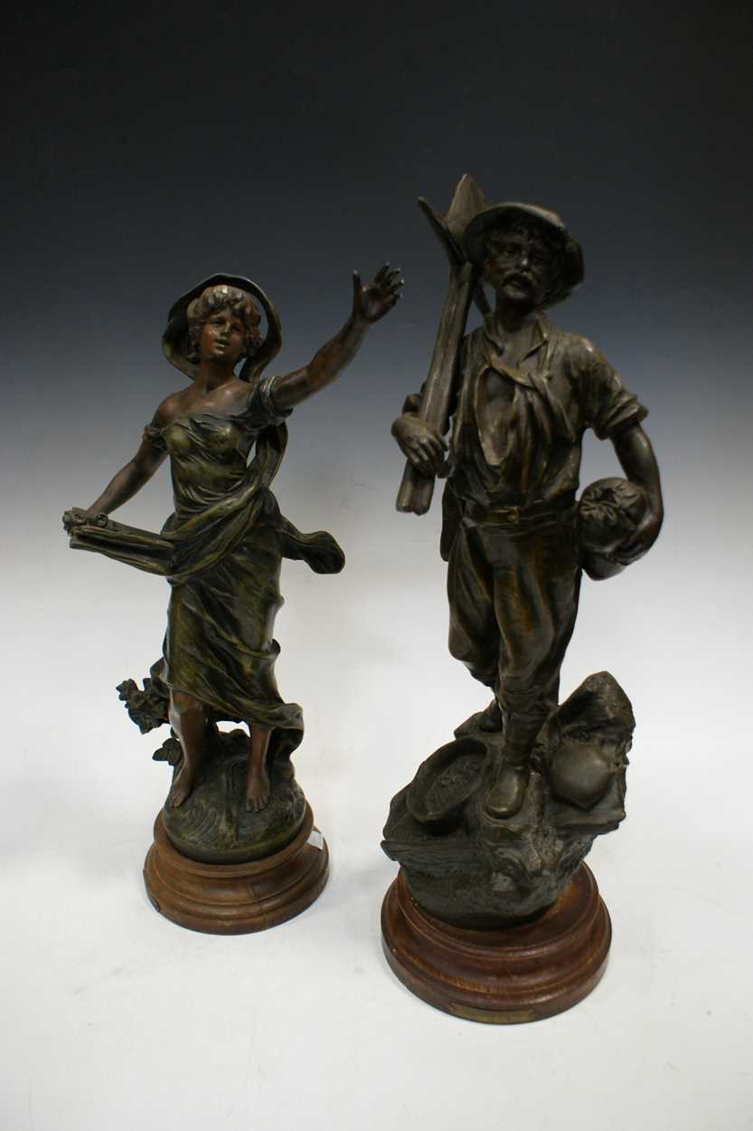Lot 52 - A pair of spelter figures of land workers,