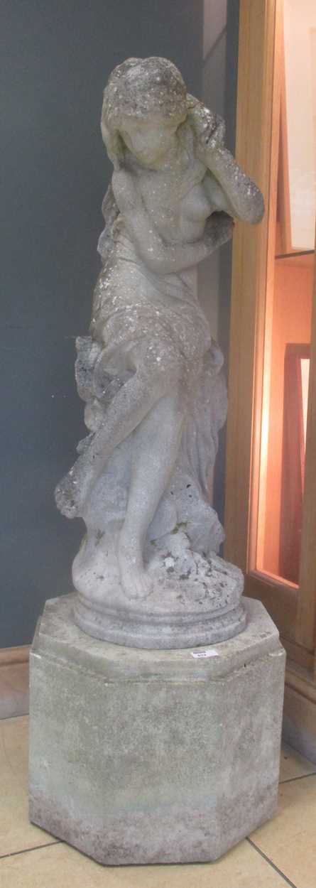 Lot 452 - A Haddonstone composite garden statue of