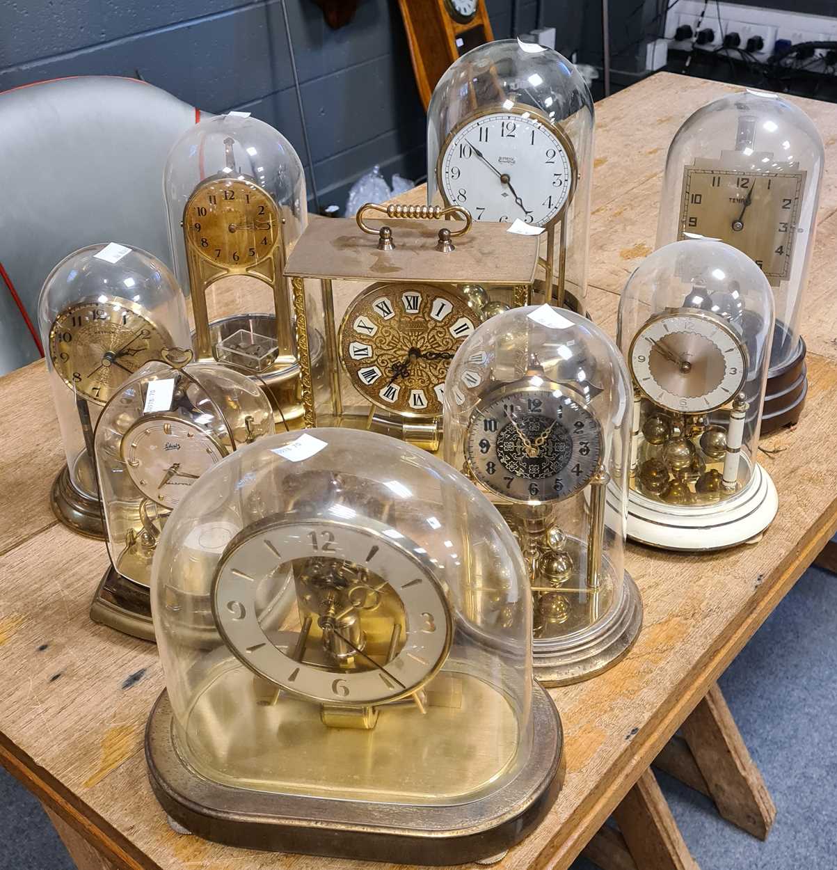 Lot 297 - A collection of 8 anniversary type clocks,