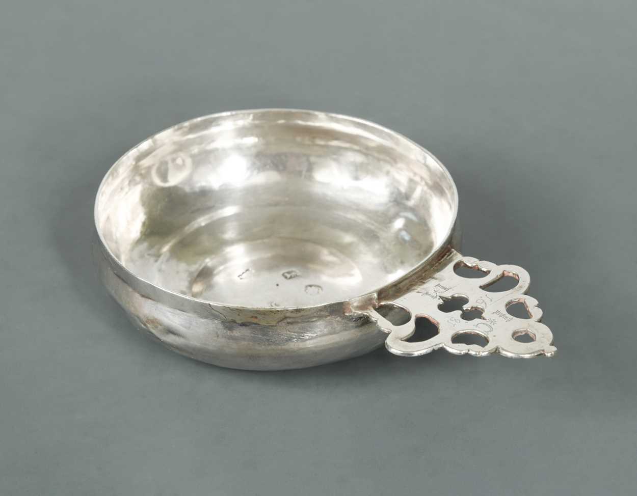 Lot 385 - A Charles II silver bleeding bowl,