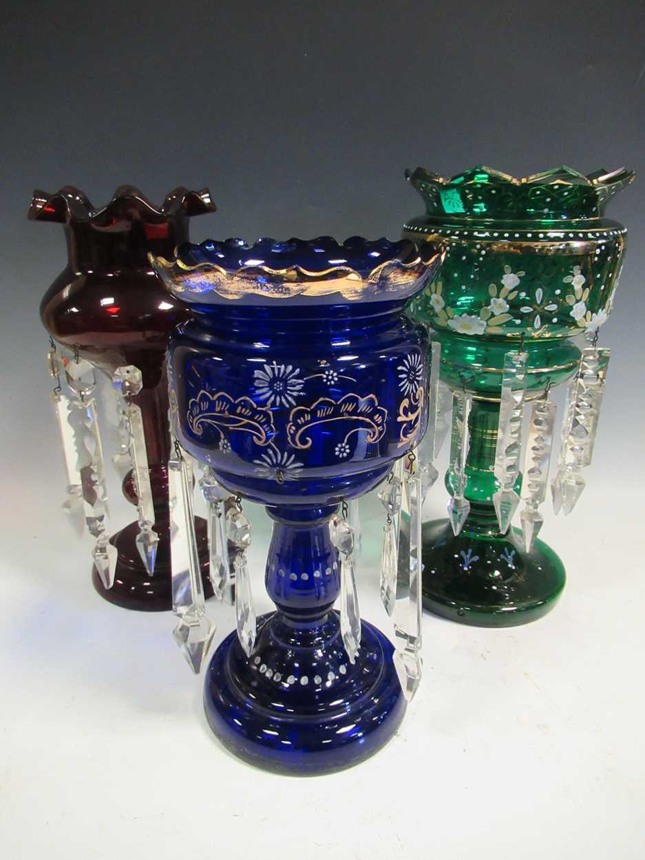 Lot 10 - Three glass lustres, in green, blue and ruby,