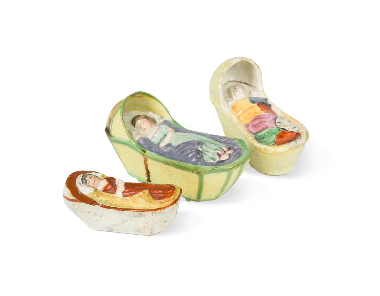 Lot 197 - Three pottery cradles, 19th century,