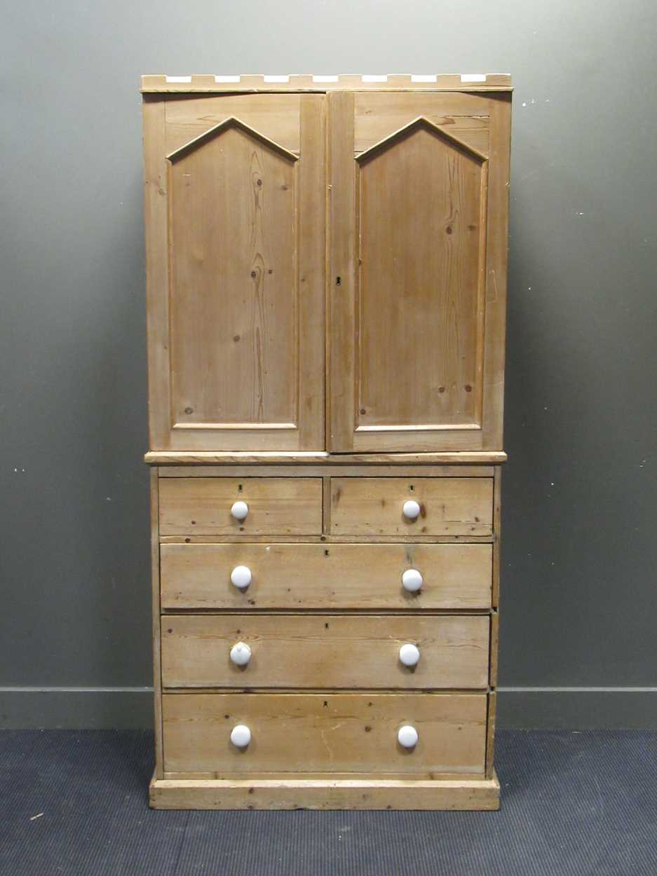 Lot 394 - A Victorian pine linen press with