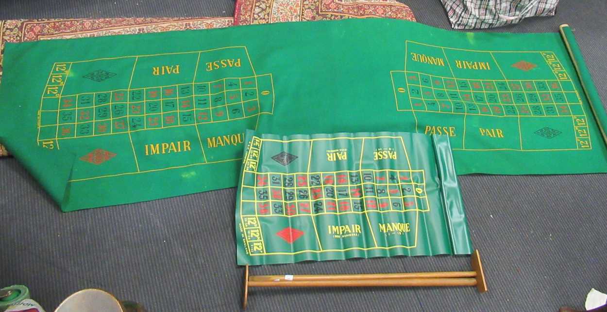 Lot 112 - Roulette wheel, box of chips. 2 chip rakes