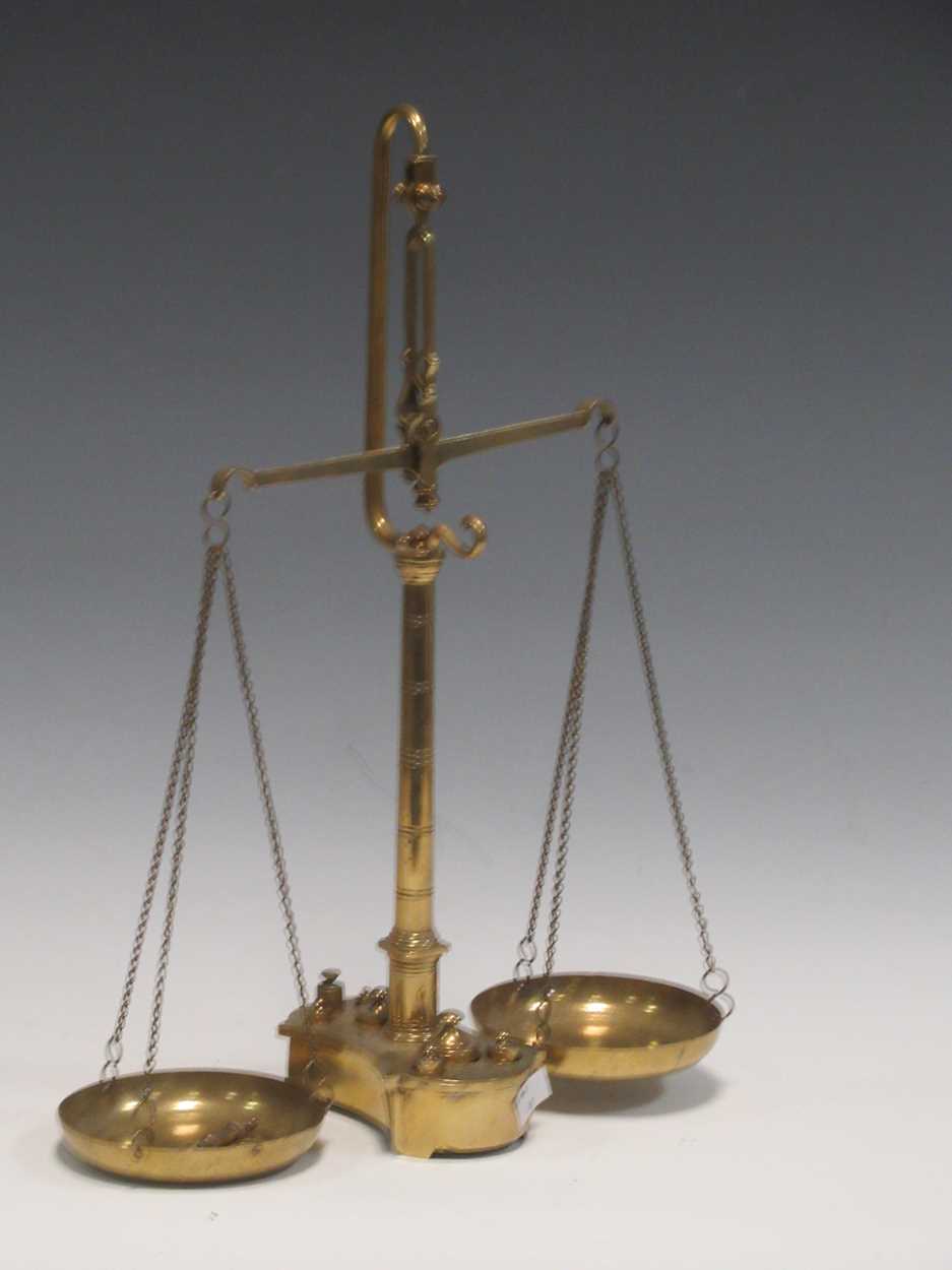 Lot 58 - A set of brass balance scales with