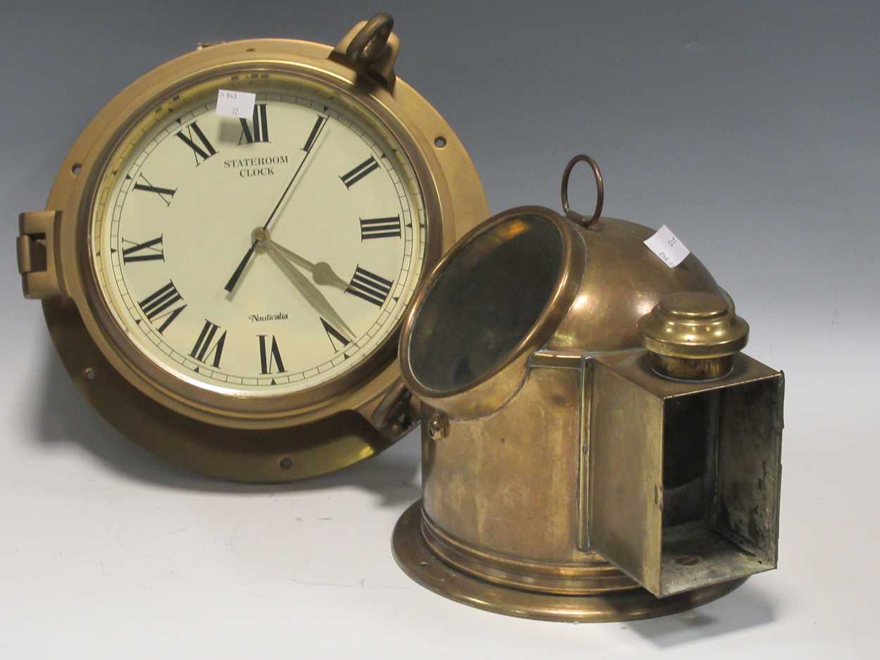 Lot 75 - A Nauticalia ships clock and a brass ships