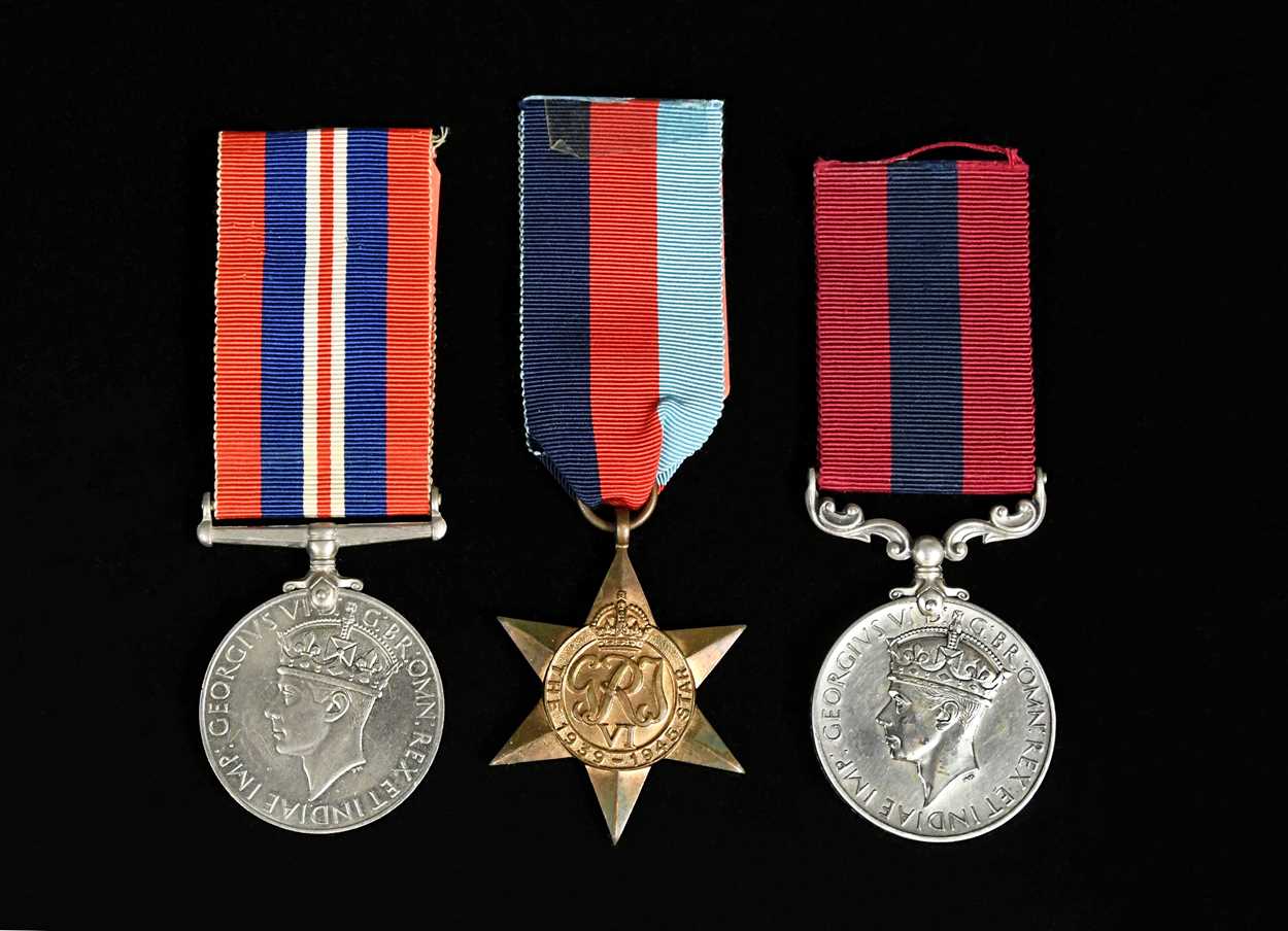 Lot 125 - A trio of World War II medals,