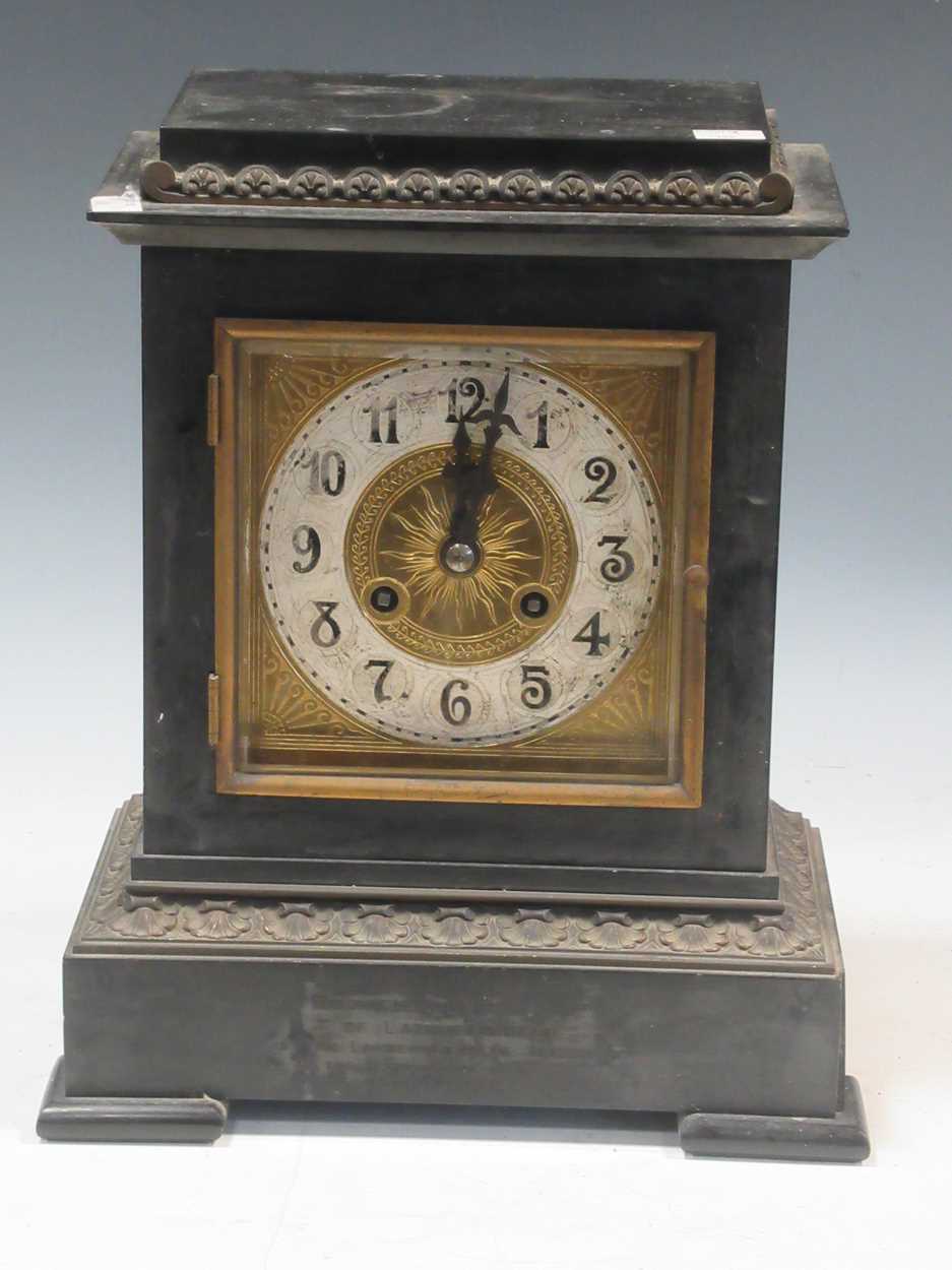 Lot 133 - A Victorian black marble mantel clock of
