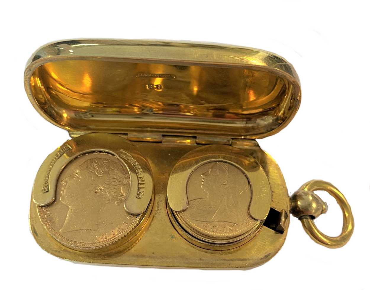 Lot 480 - A sovereign case containing a Victorian